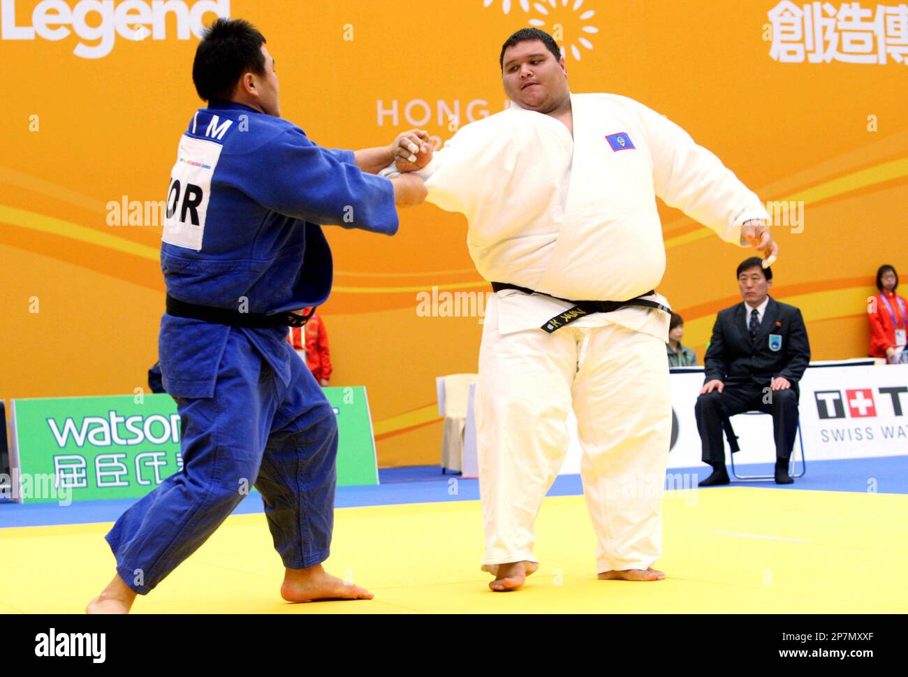 Kim Soo-whan of South Korea, in blue uniform, and Ricardo Dunn Blas Jr ...