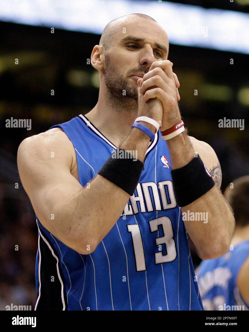 Orlando Magic forward Marcin Gortat, of Poland, reacts to being called ...