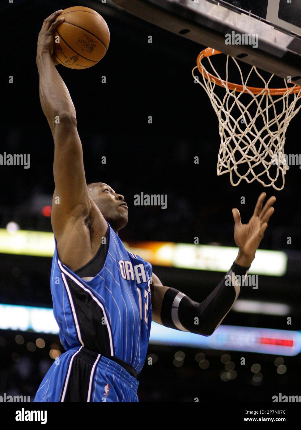 Orlando Magic center Dwight Howard dunks the ball against the Phoenix ...