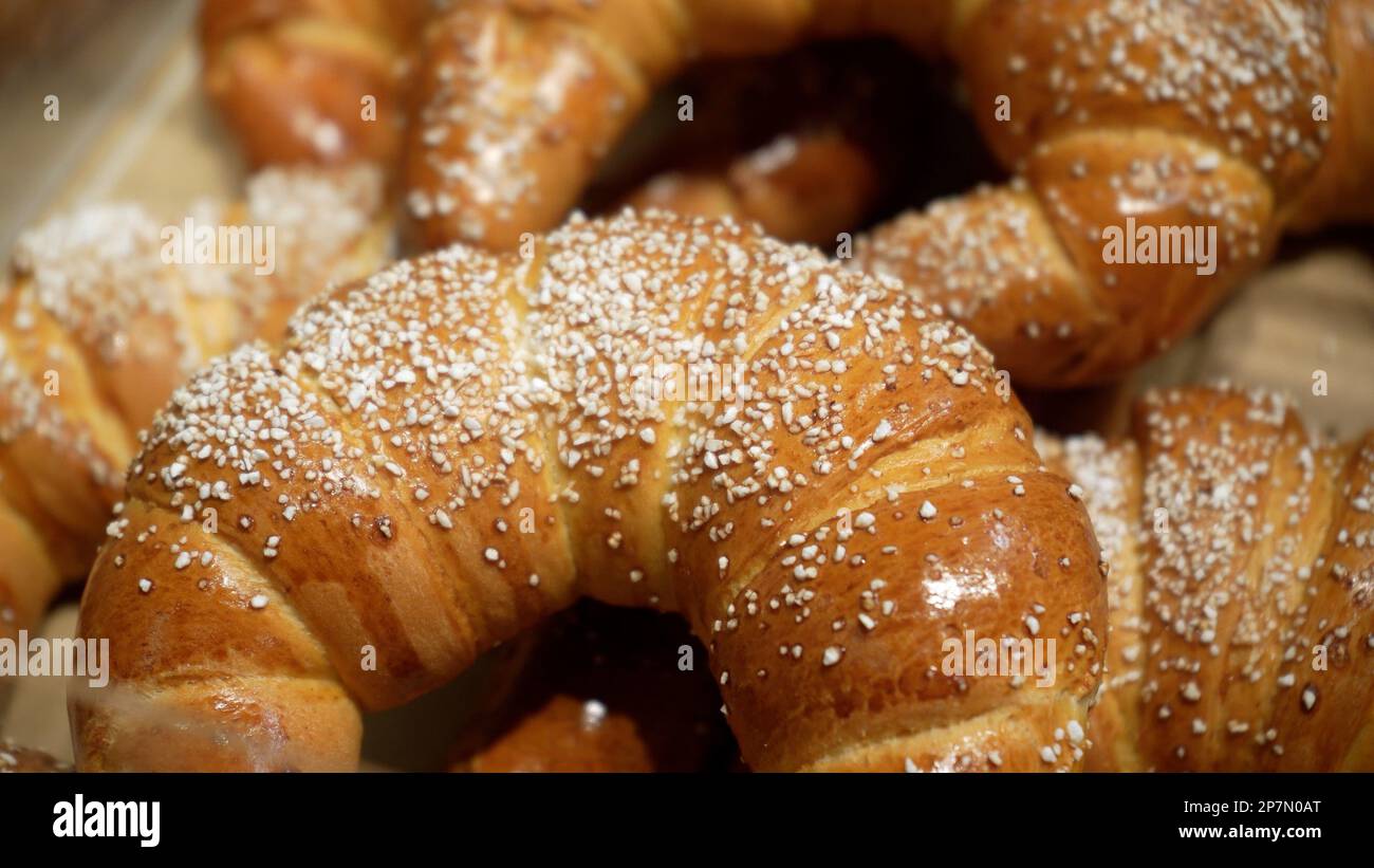 Rows of Warm Freshly Baked Bread Rolls on Display in Bakery Stand at ... Rows of Warm Freshly Baked Bread Rolls on Display in Bakery Stand at ...
