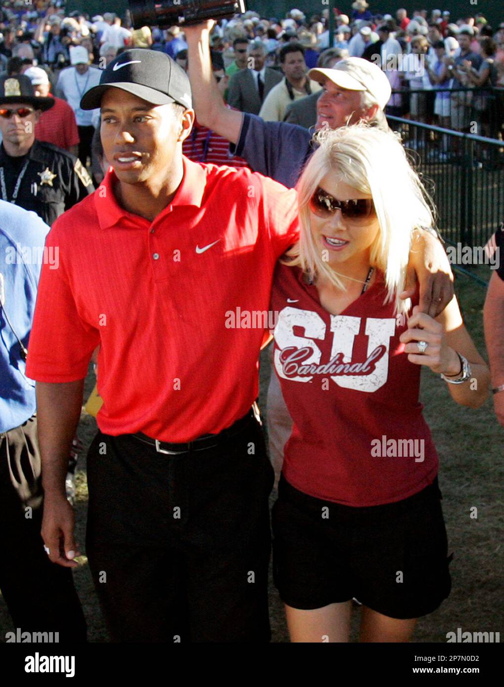FILE - In this Aug. 20, 2006, file photo, Tiger Woods celebrates with ...