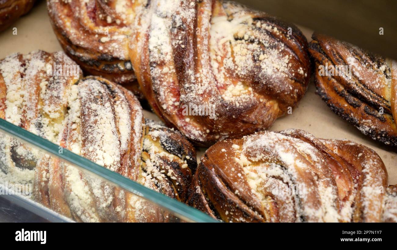 Rows of Warm Freshly Baked Bread Rolls on Display in Bakery Stand at ...