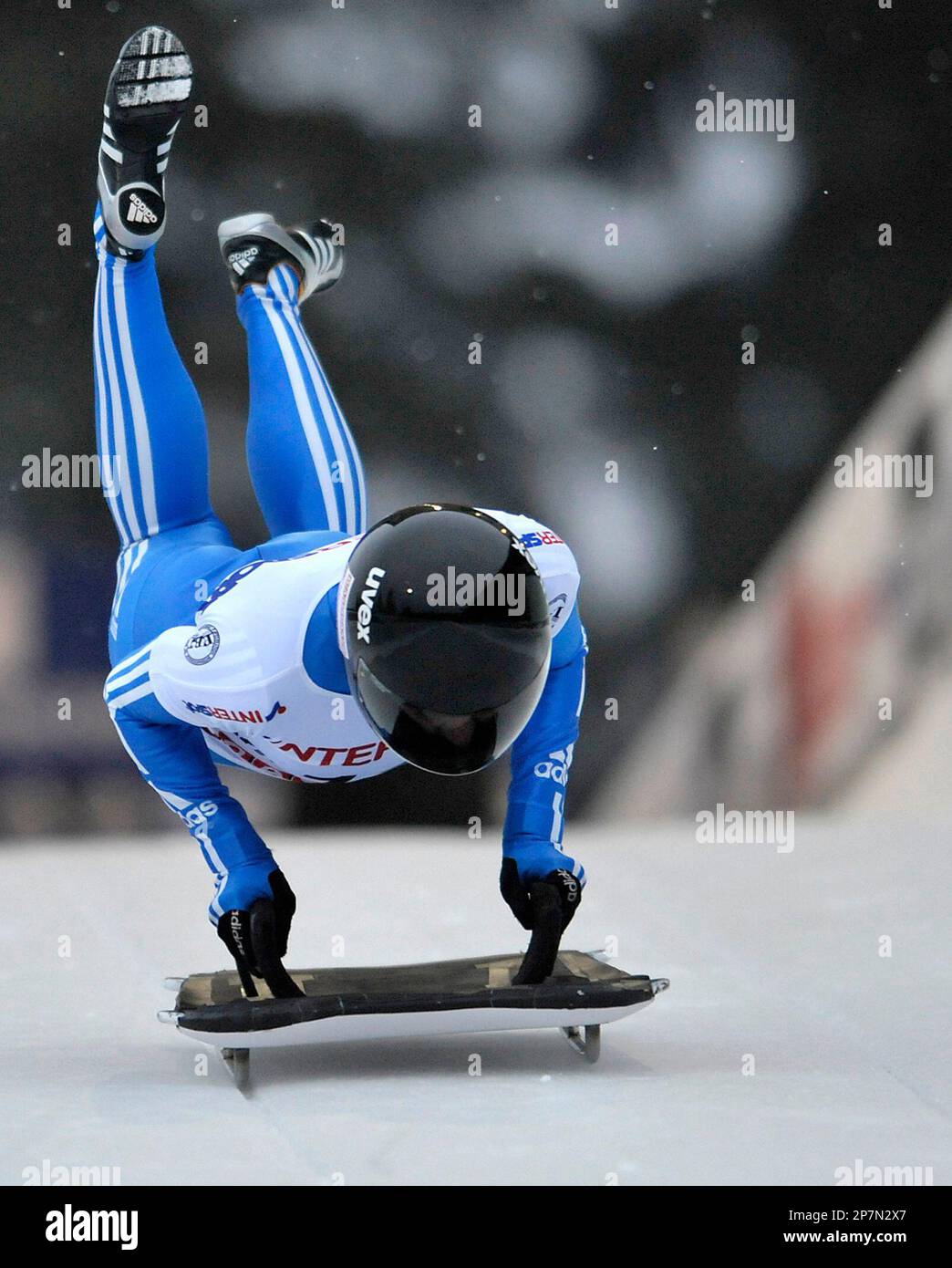 Russia's Svetlana Trunova jumps on her skeleton on her way to place ...