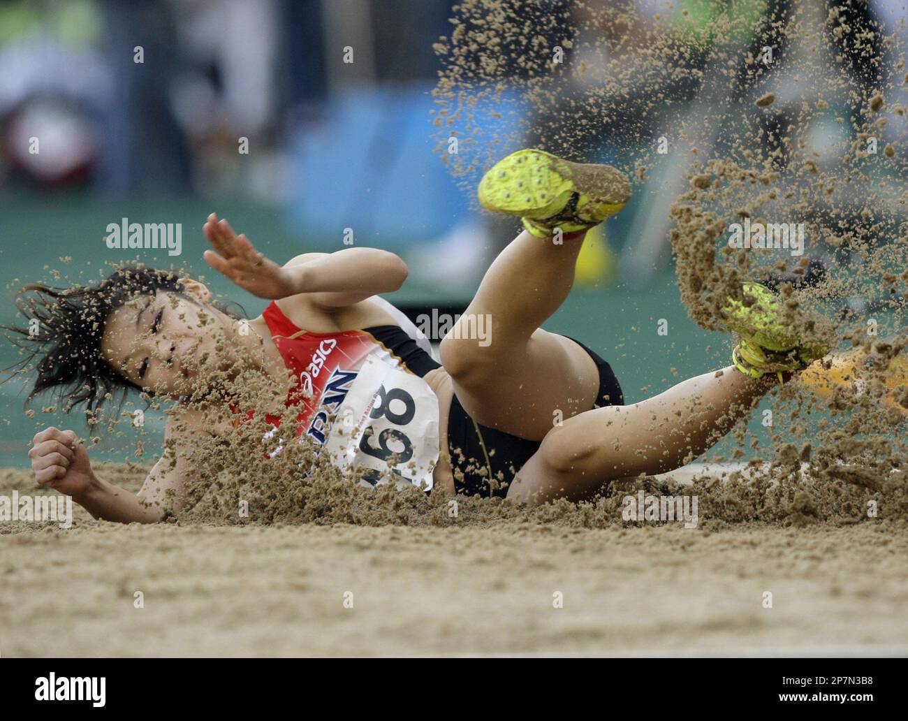 Yoshimi Sato of Japan competes in the women's long jump finals at the ...