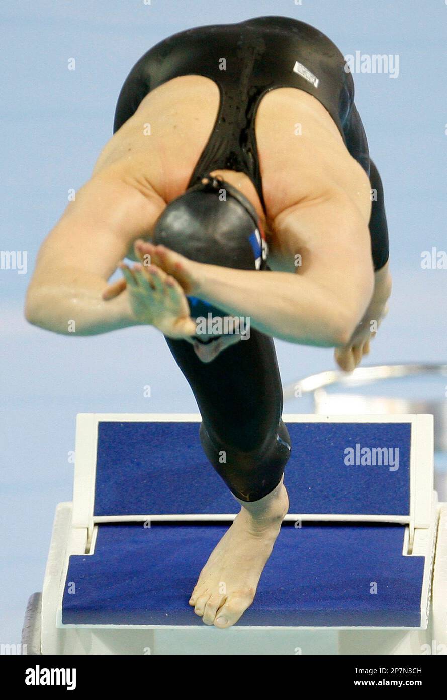 France's Sophie De Ronchi dives during a heat of 200m breaststroke at ...