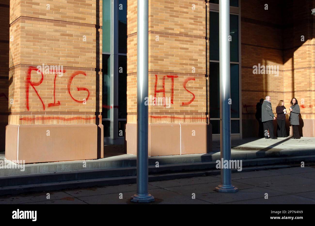 Spray-painted words cover some exterior walls of the Brockton, Mass ...