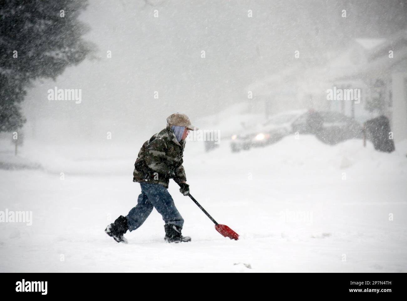 Alex Bruch, 9, shovels snow from his driveway in Clarence, a suburb of ...