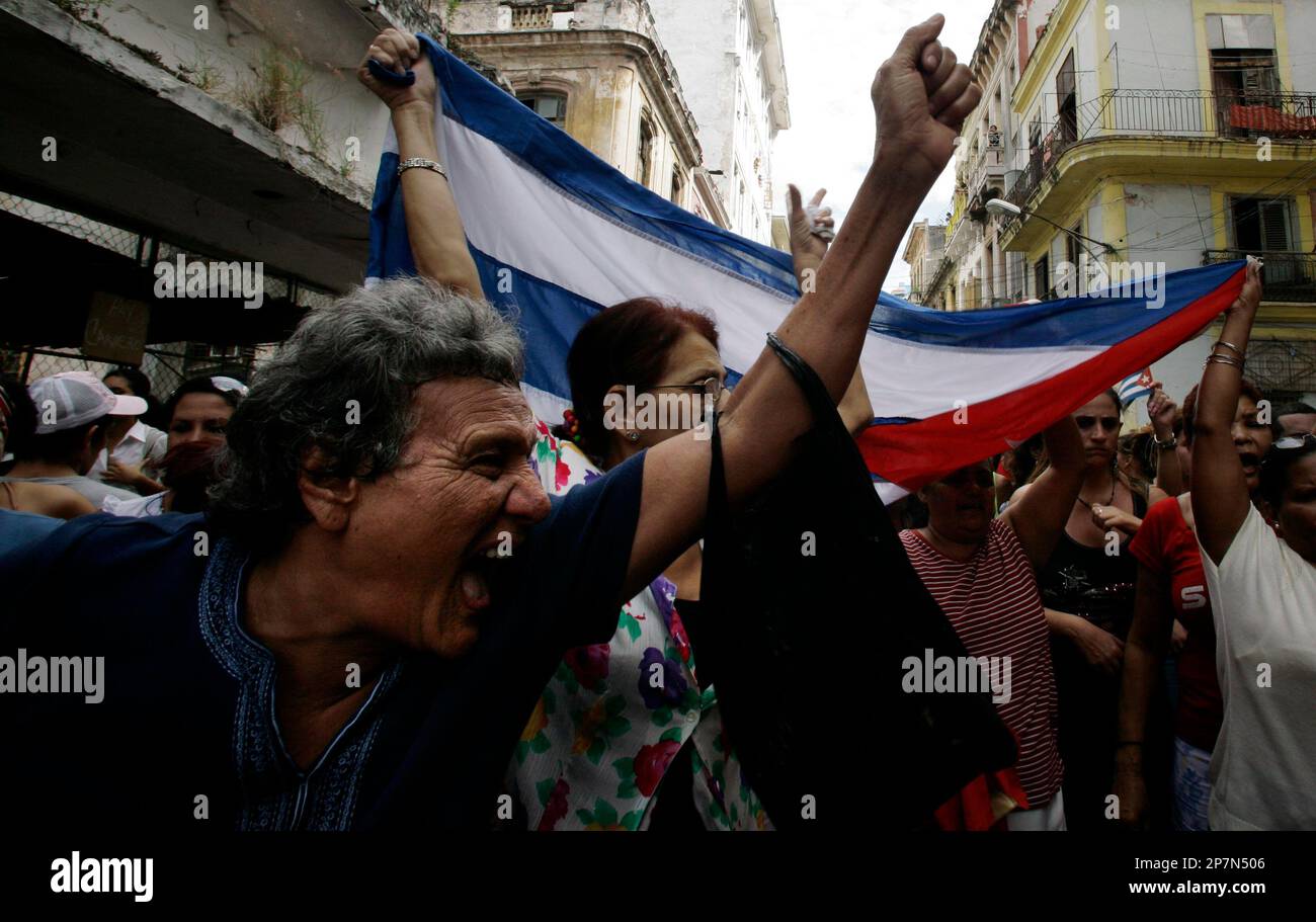 Cuba's government's supporters shout slogans in favor of Cuban leader ...