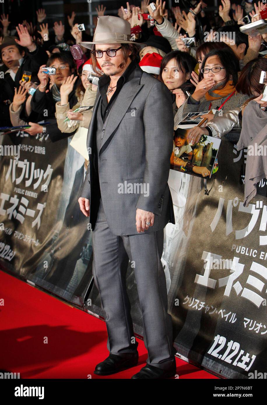 Hollywood actor Johnny Depp poses for photographers during Japan ...