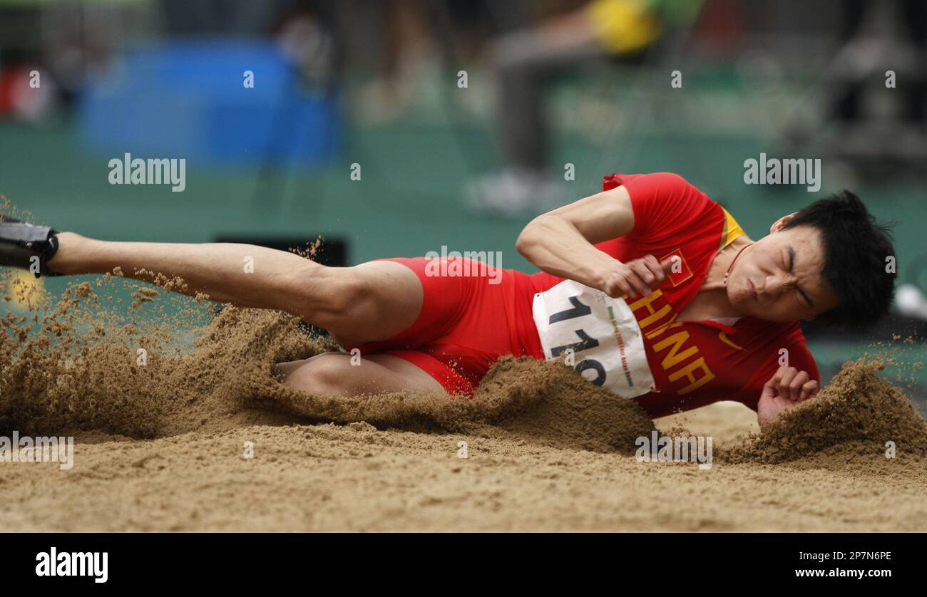 Li Jinzhe of China competes in the men's long jump final of the East ...