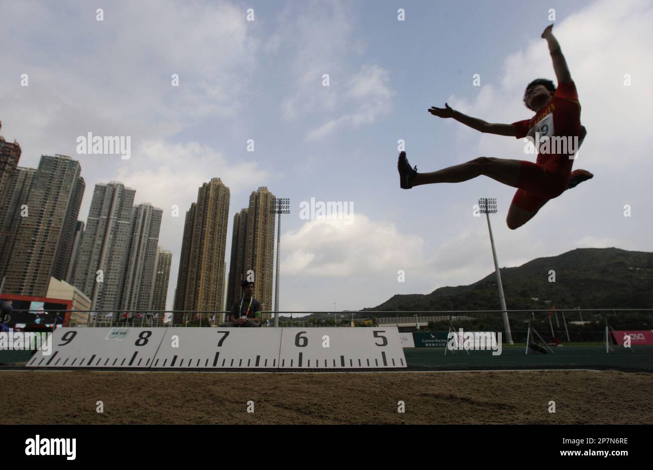 Li Jinzhe of China competes in the men's long jump final of the East ...