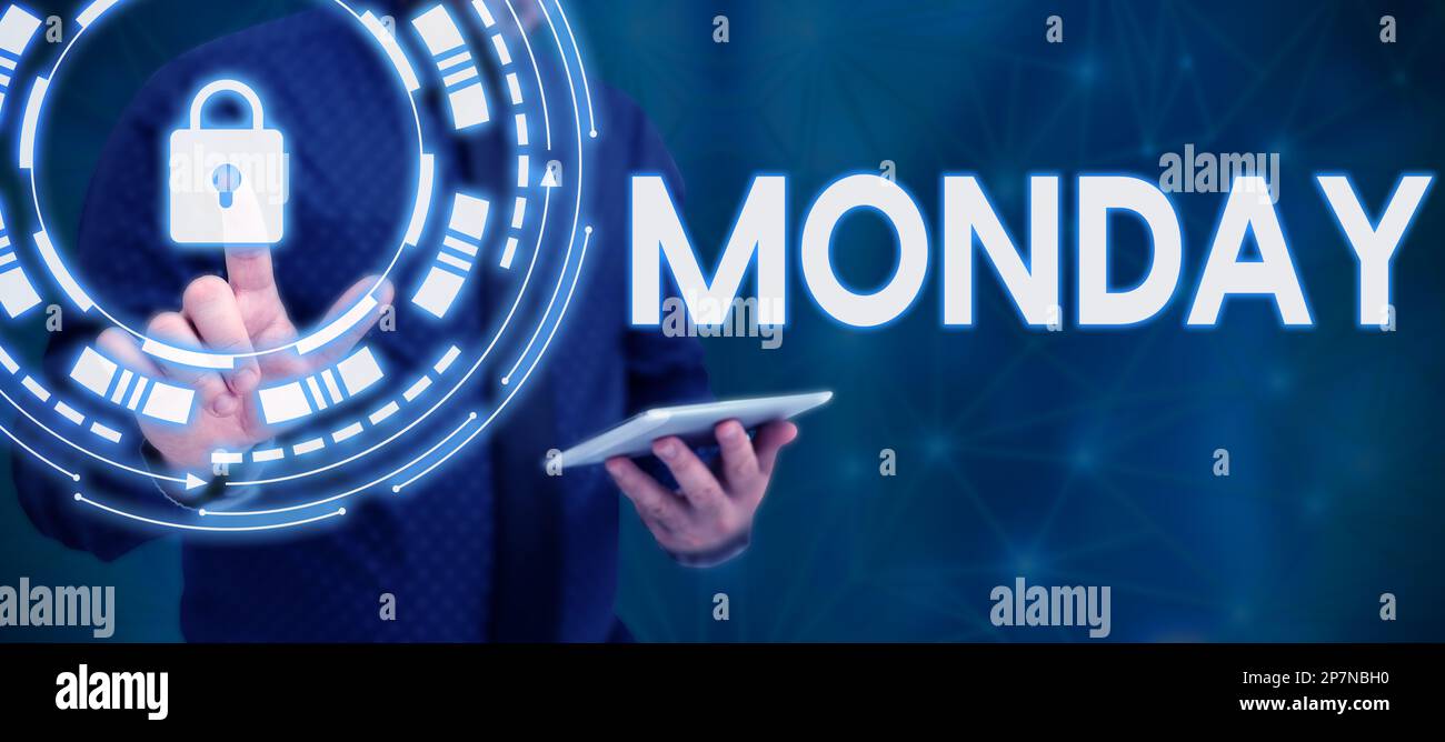 Hand writing sign Monday. Internet Concept the day of the week after ...