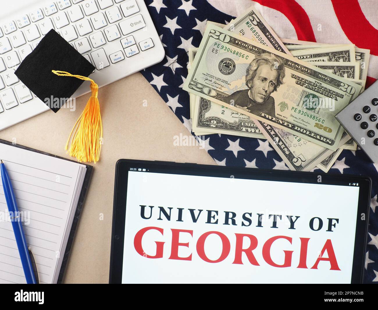 In this photo illustration, University of Georgia logo seen displayed ...