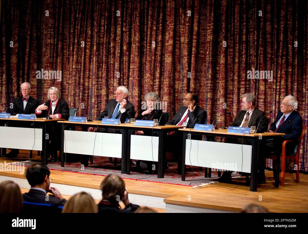 Nobel Prize laureates seated during a press conference at the Royal ...