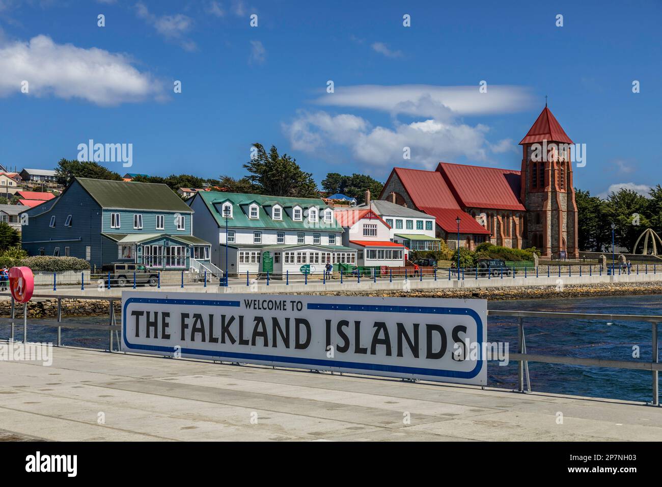 A sign at the passenger entrance to the jetty in Stanley, Falkland ...