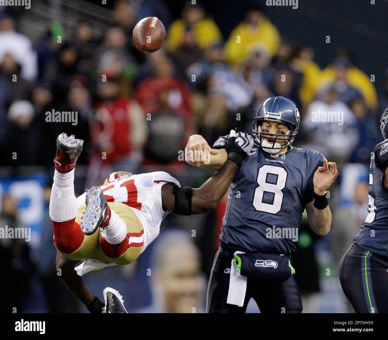 Seattle Seahawks quarterback Matt Hasselbeck (8) passes under pressure ...