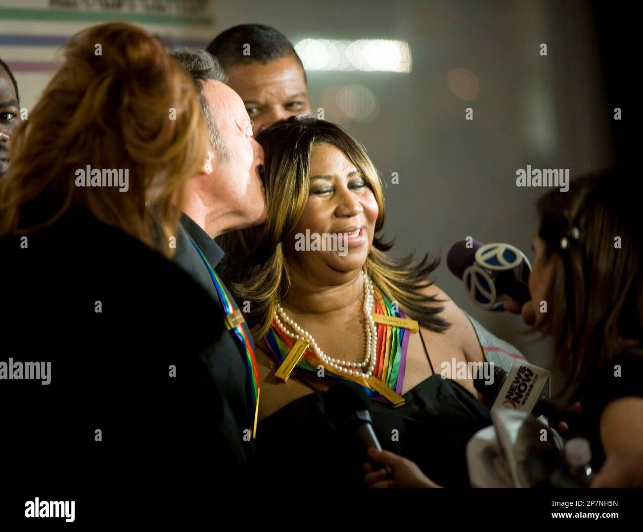 Bruce Springsteen gives a kiss to former Kennedy Center Honoree Aretha ...