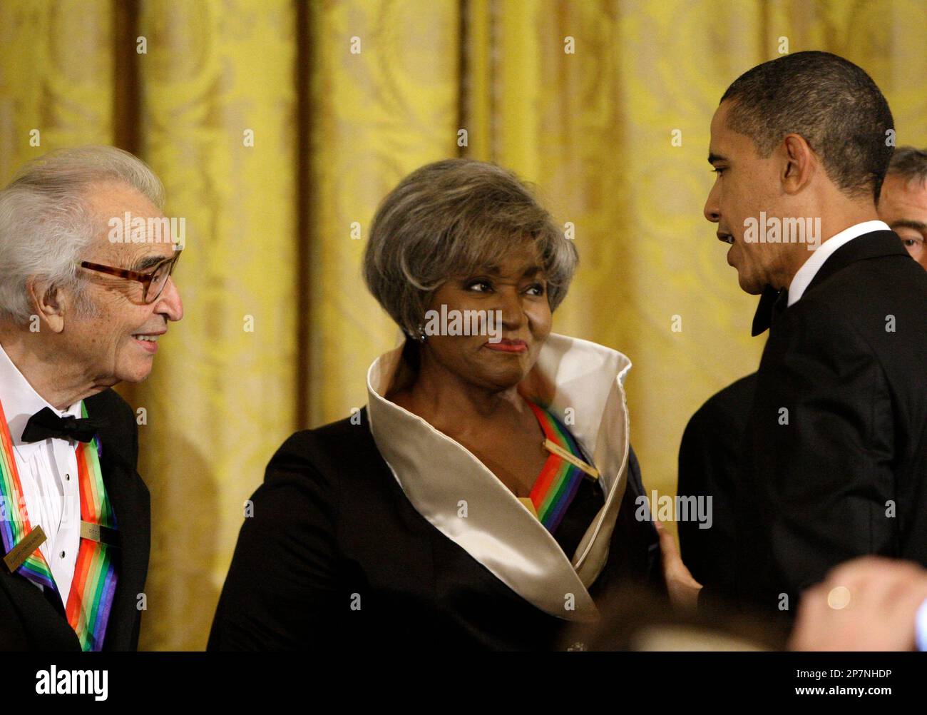 President Barack Obama greets Kennedy Center honorees Dave Brubeck, left, and Grace Bumbry in ...
