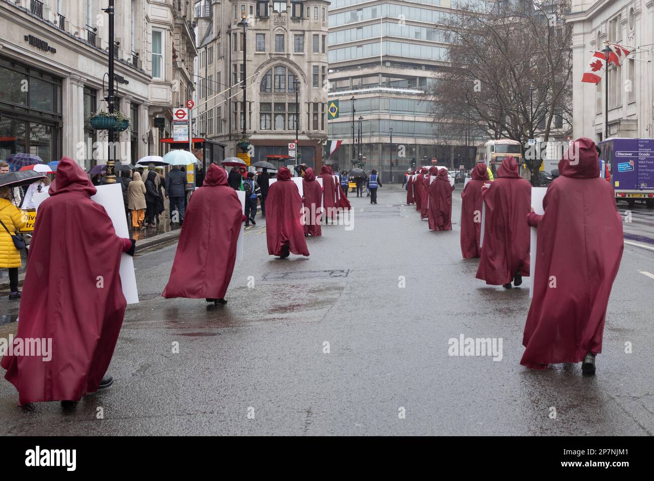 London, England, UK 08/03/2023 British Iranian women dress as handmaids ...