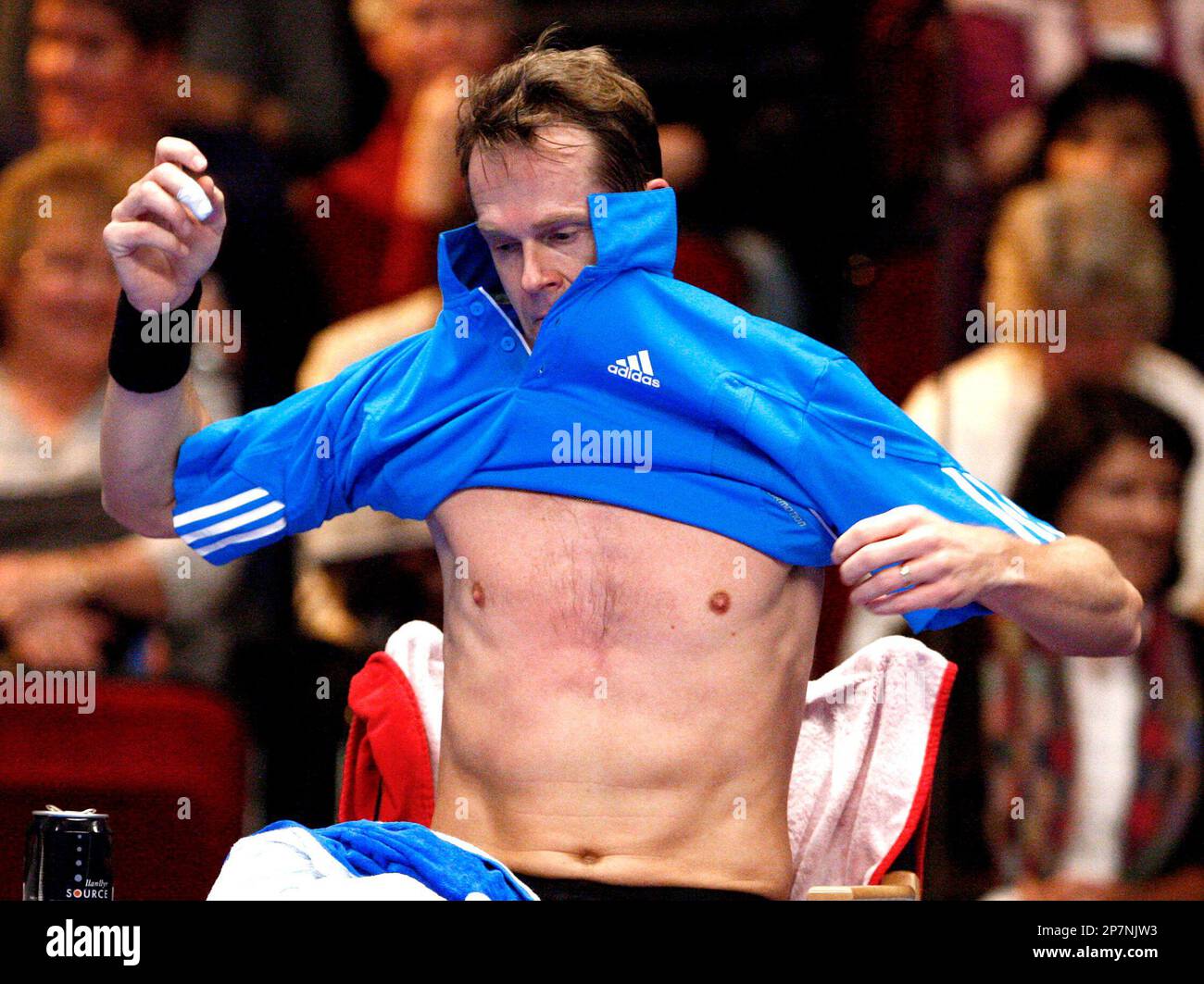 Sweden's Stefan Edberg changes his shirt during his Champions Tour ...