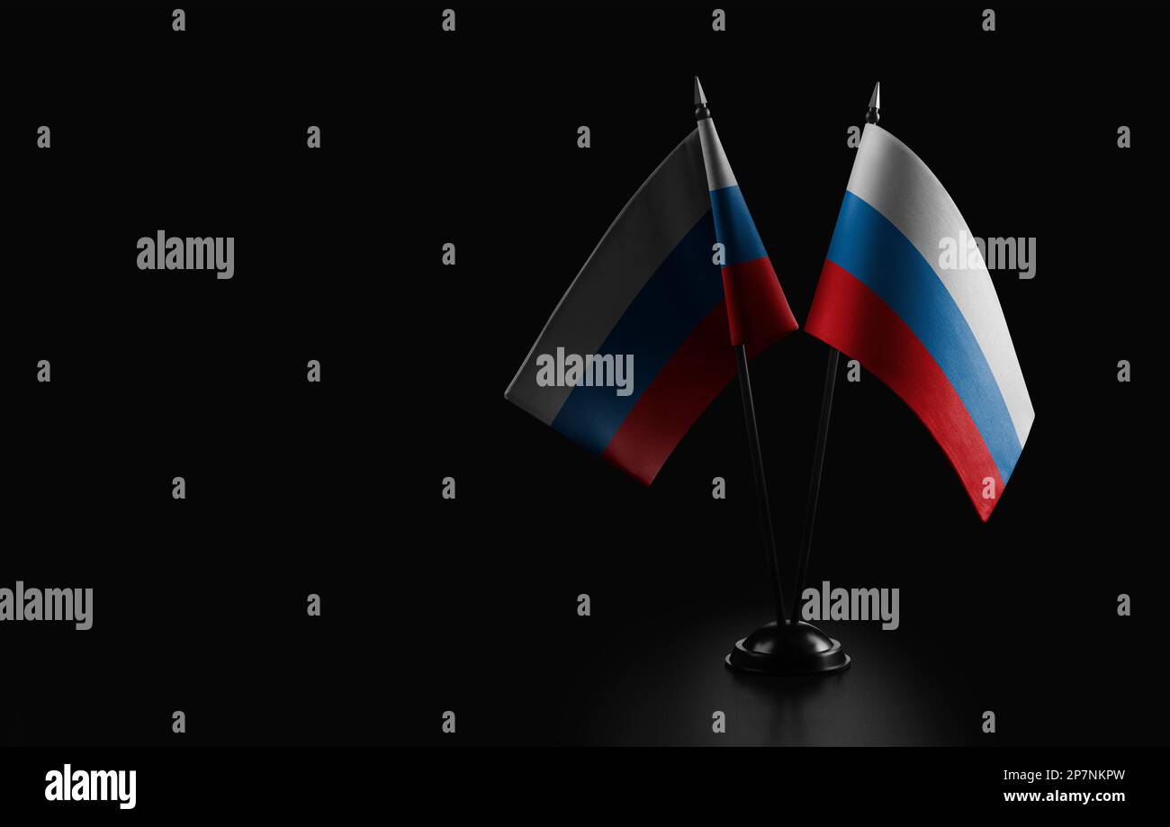 Small national flags of the Russia on a black background Stock Photo ...