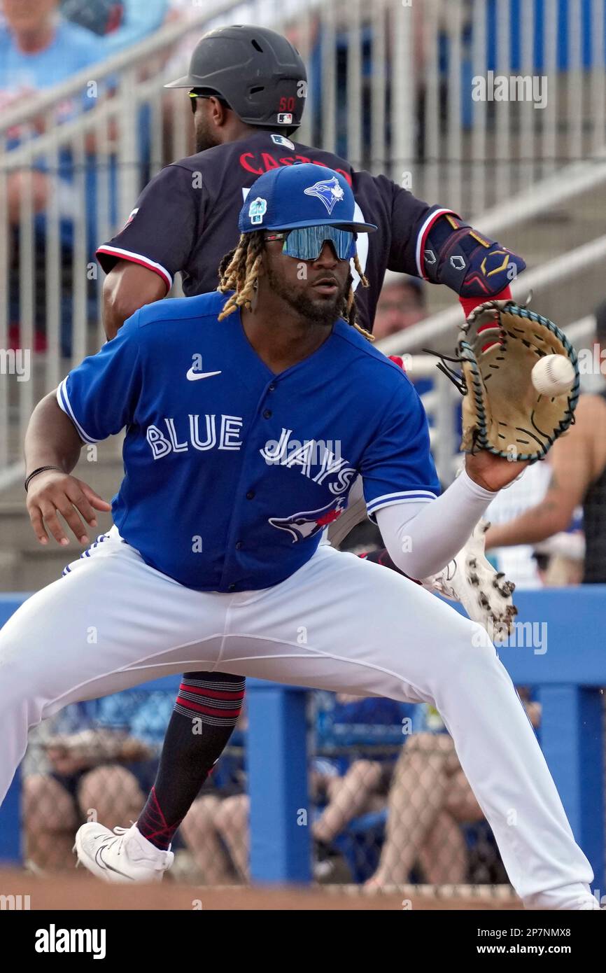 Toronto Blue Jays first baseman Ranier Nunez fields the throw as ...