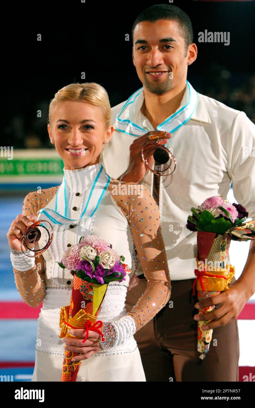 German Aliona Savchenko, left, and Robin Szolkowy pose with their ...