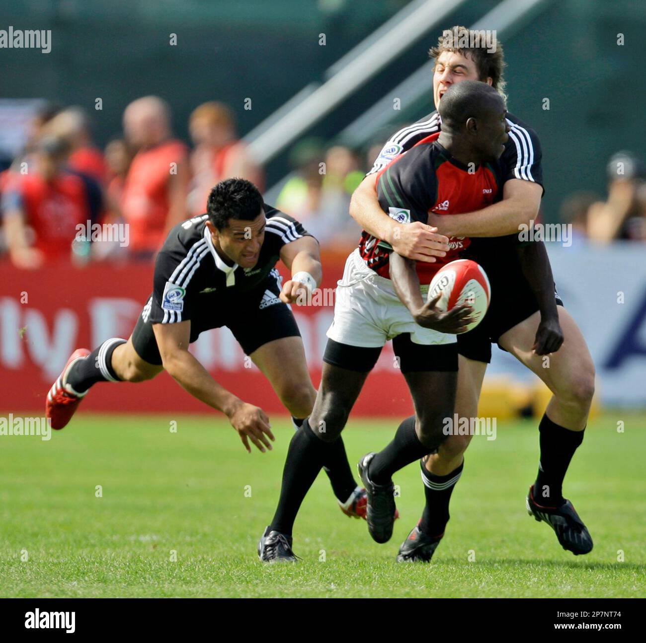 New Zealand's Kurt Baker tackles Kenya's Sidney Ashioya during the ...