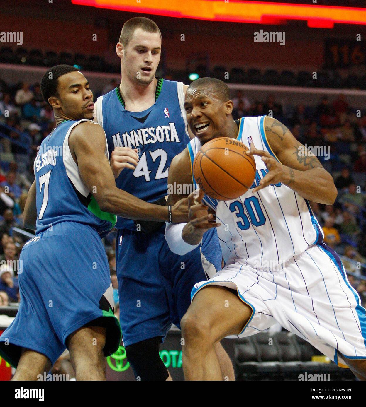 Minnesota Timberwolves guard Ramon Sessions (7) reaches in on New ...
