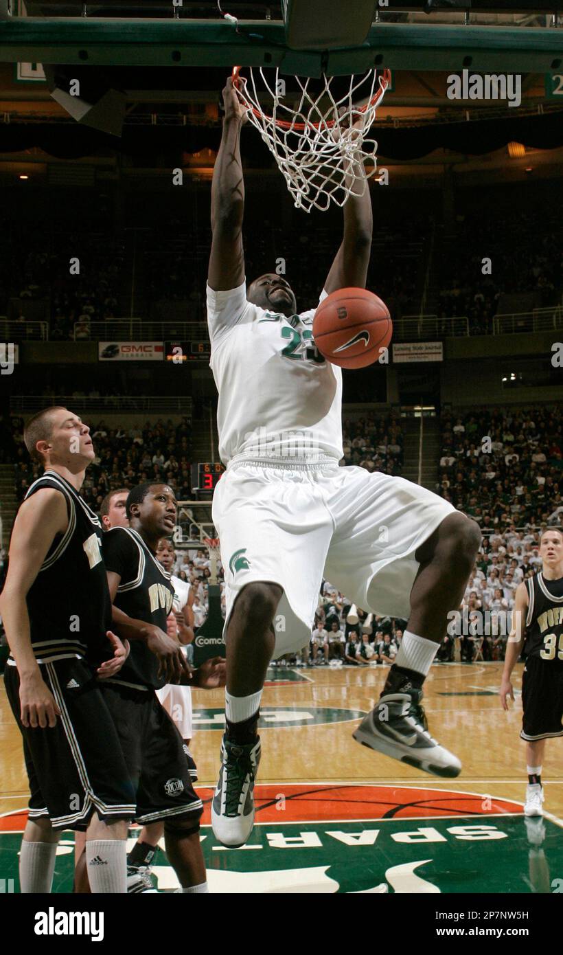 Michigan State's Draymond Green (23) dunks over Wofford's Corey ...