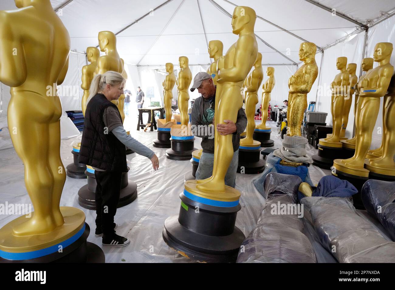 Antje Menikheim, left, lead scenic painter for Sunday's 95th Academy ...
