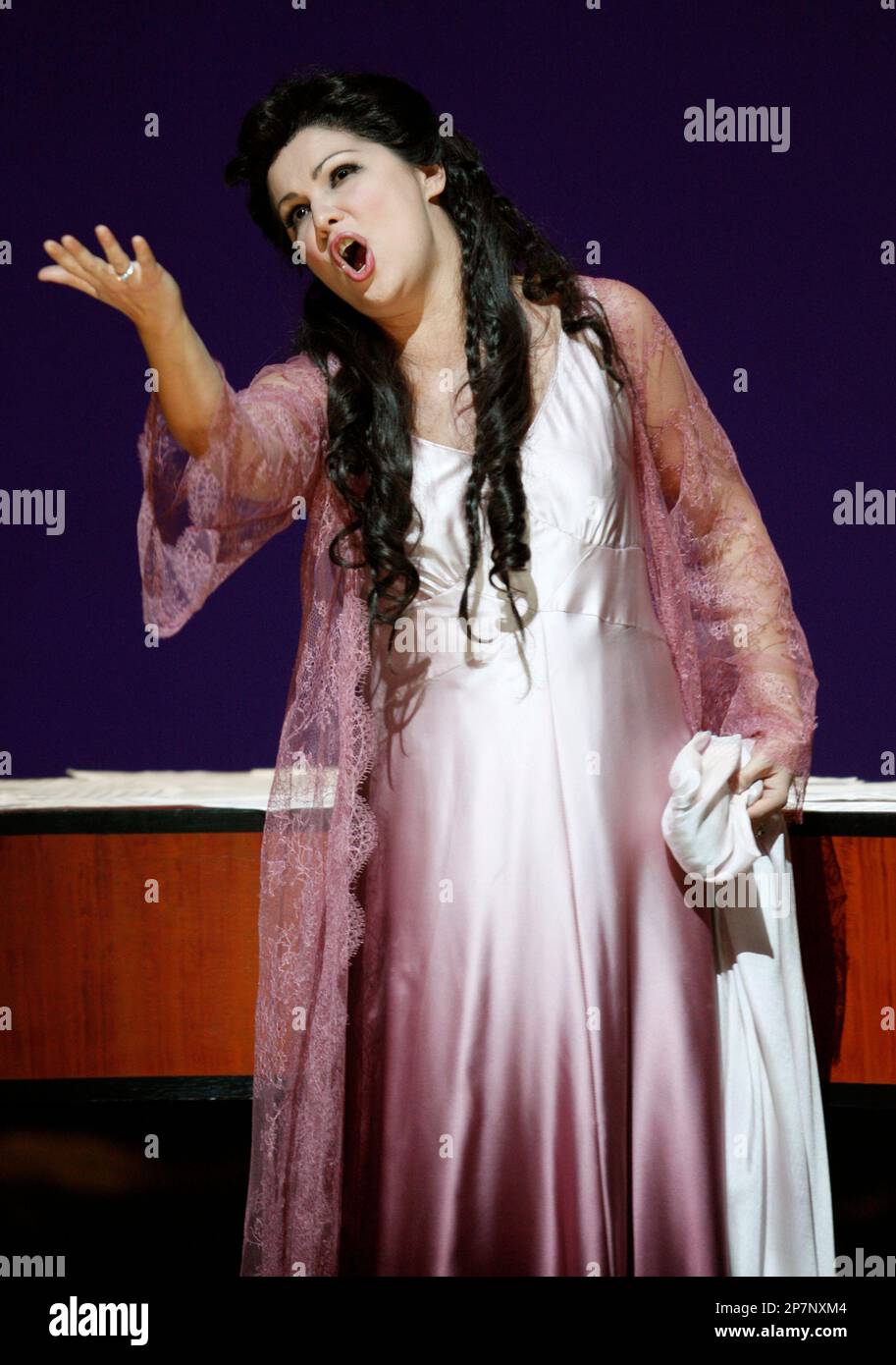 Anna Netrebko, as the young singer, Antonia, performs during a dress ...