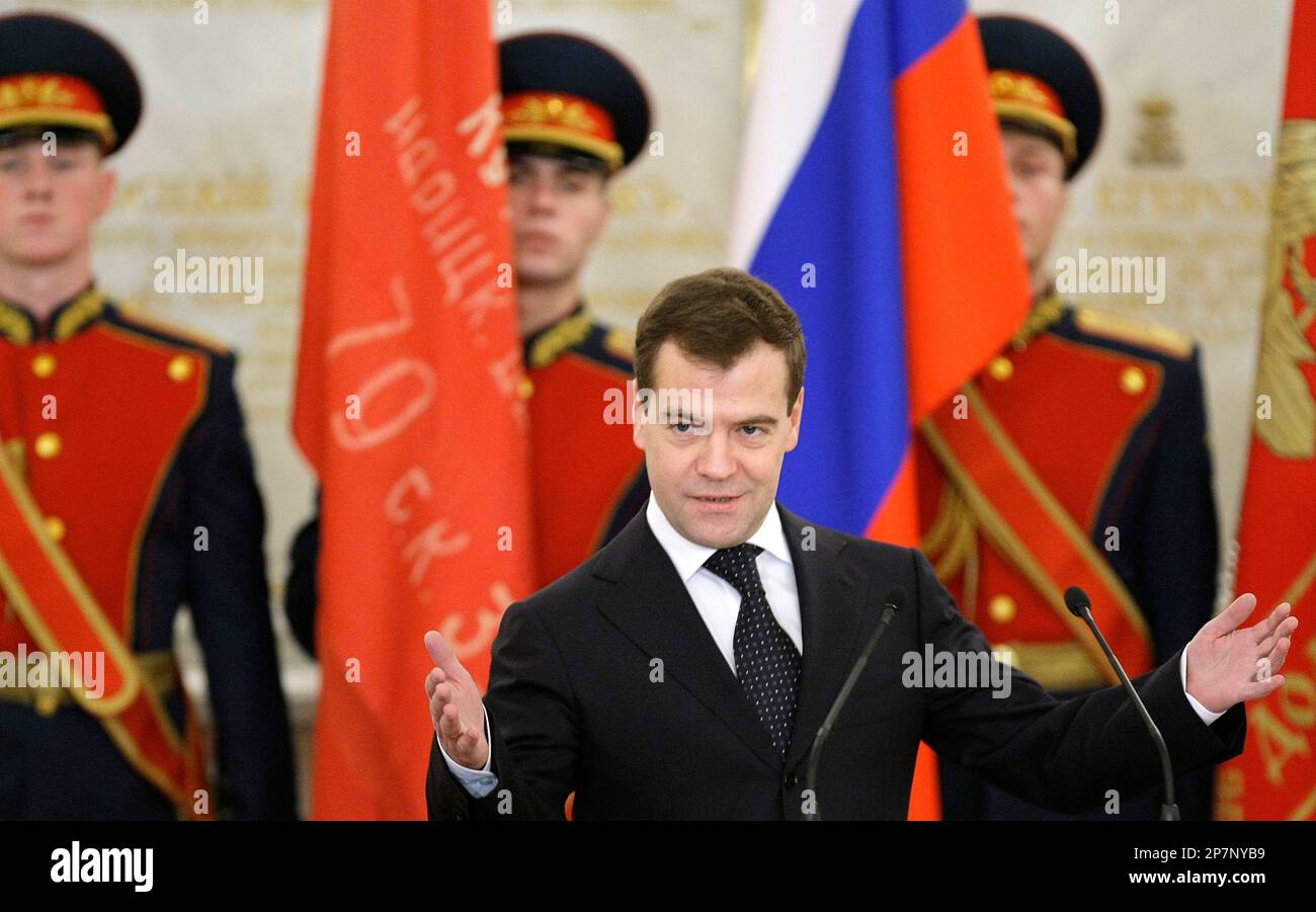 Russian President Dmitry Medvedev, center, speaks to Russian World War ...