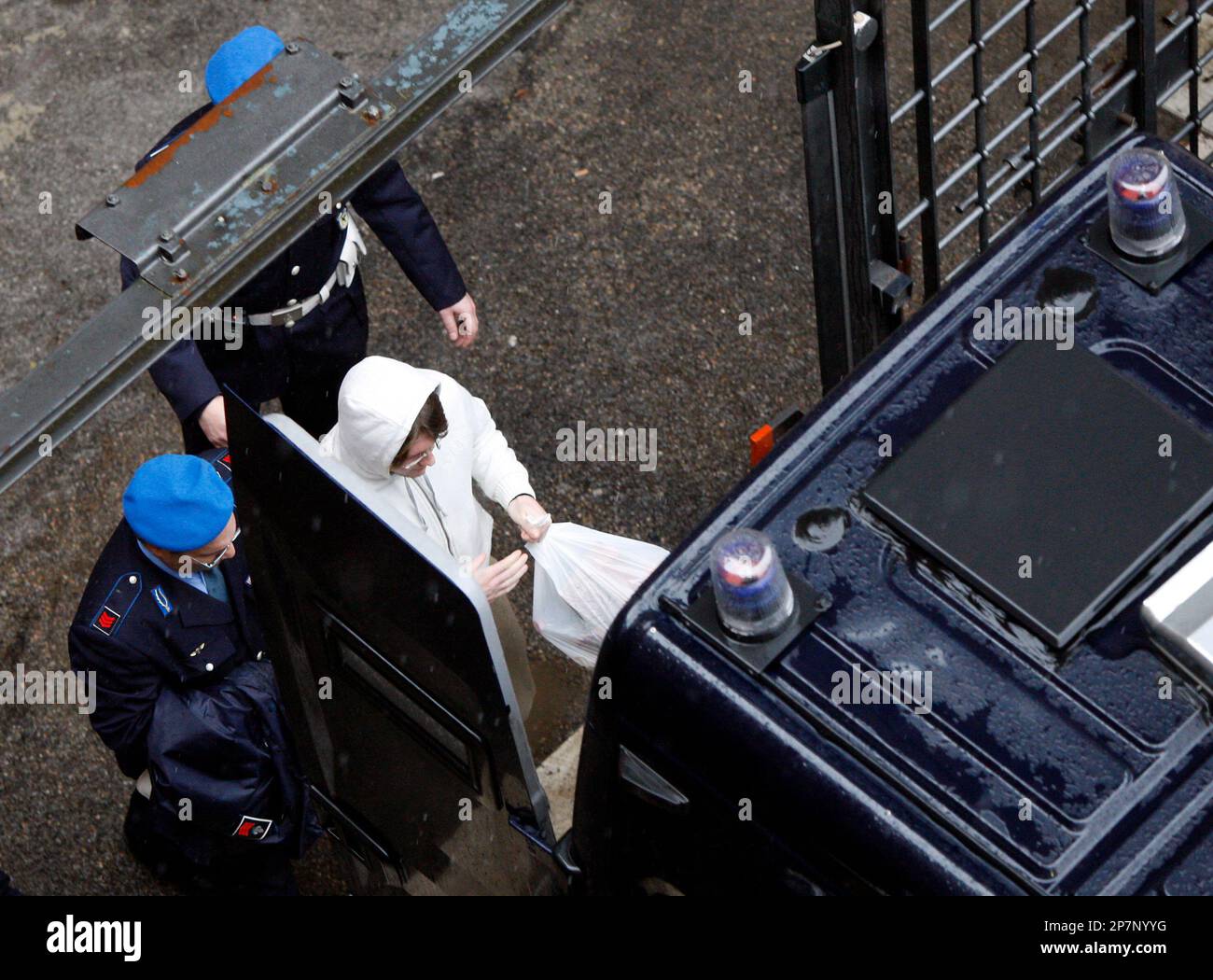 Italian murder suspect Raffaele Sollecito, in white jersey, is ...