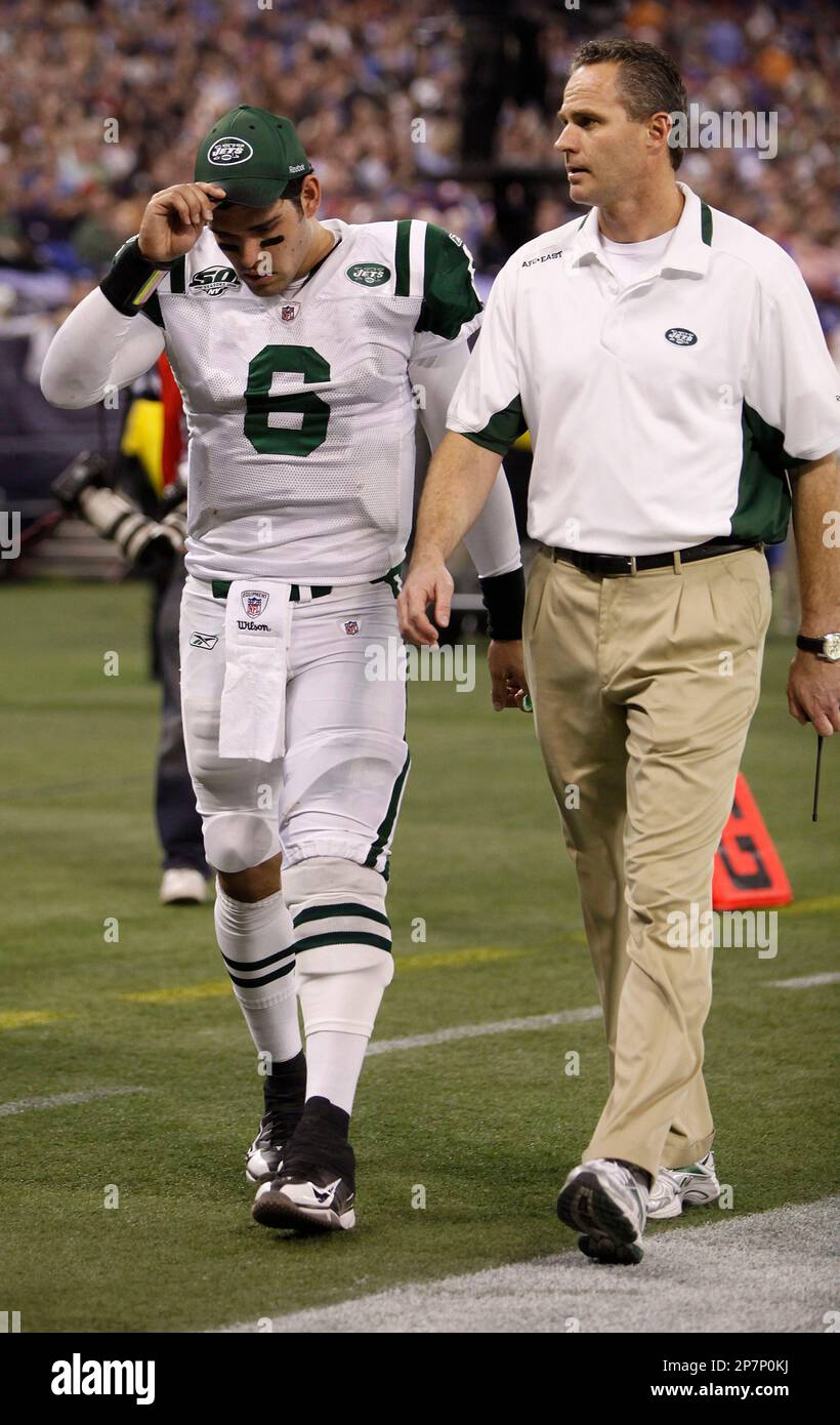 New York Jets quarterback Mark Sanchez (6) walks off the field after an ...