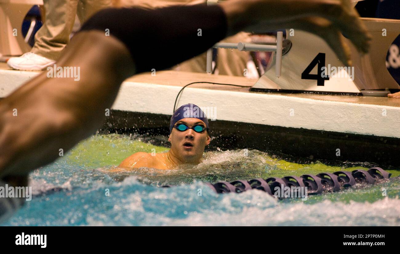 After swimming first leg of the Men's 4 x 50 yard Freestyle Relay ...