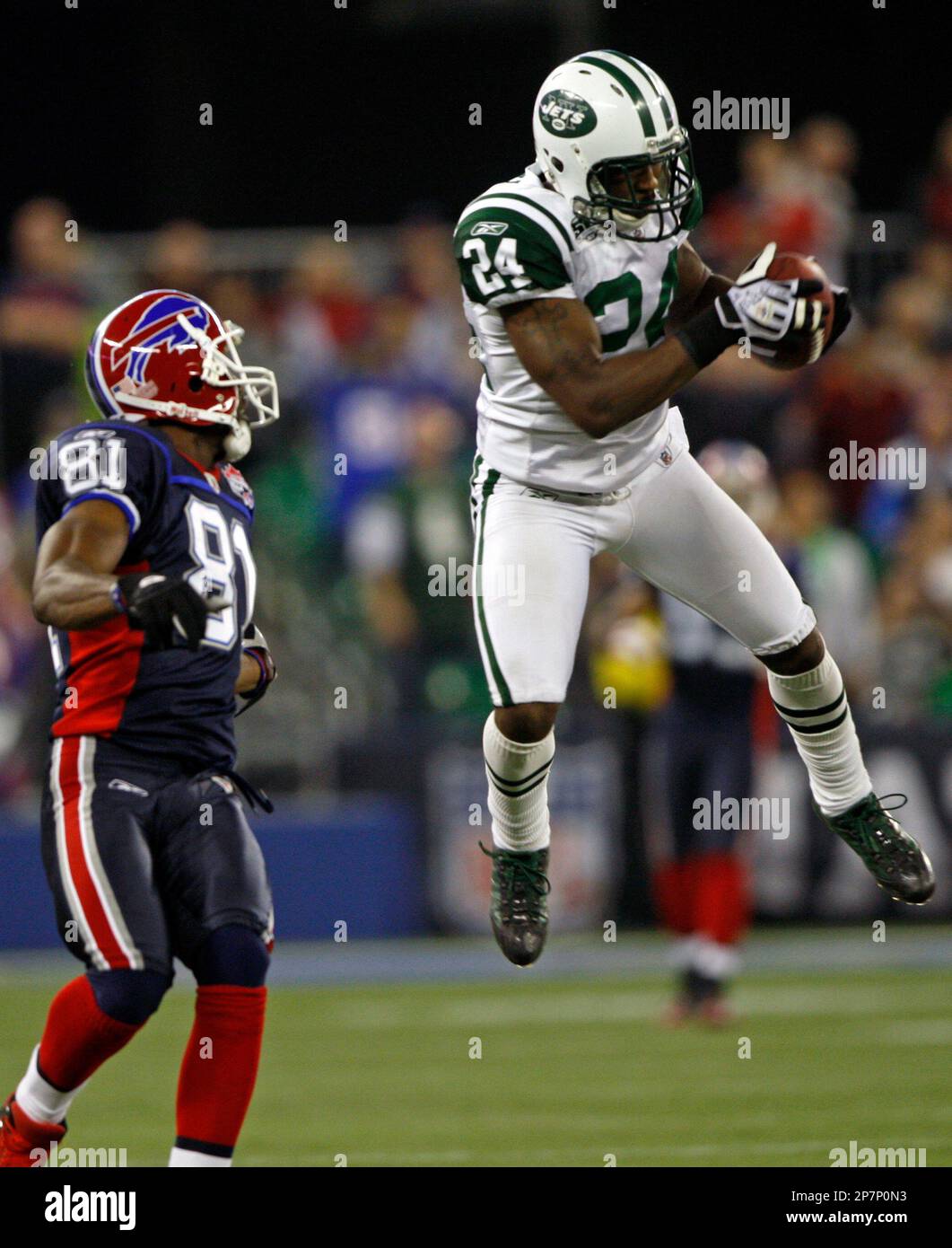 New York Jets corner back Darrelle Revis (24) intercepts a pass ...