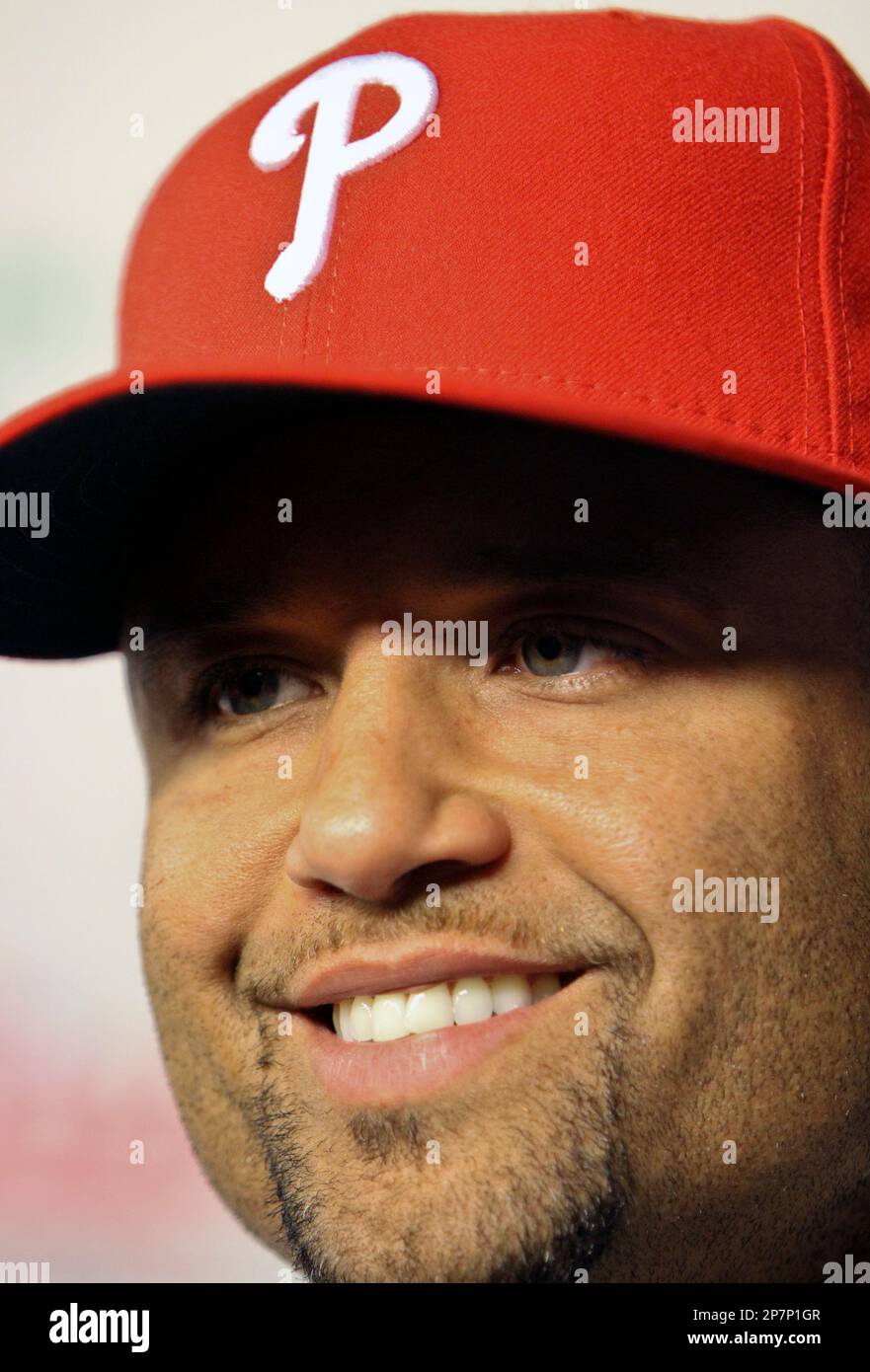 Placido Polanco talks with reporters following a news conference in ...