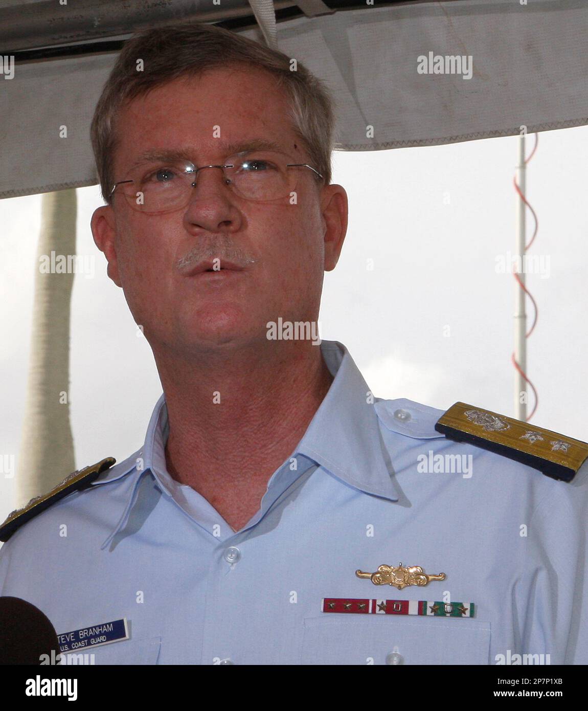 U.S. Coast Guard Rear Admiral Steve Branham talks to reporters at Landshark Stadium in Miami ...