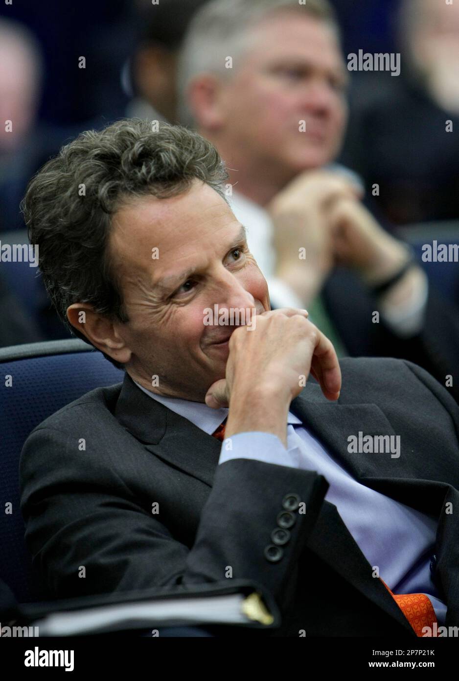 Treasury Secretary Timothy Geithner listens at the opening of President ...