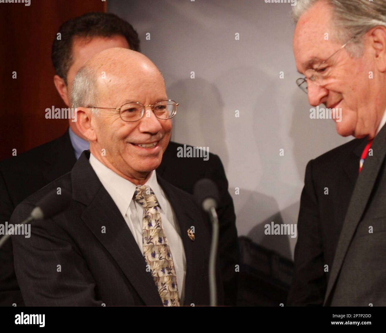 Sen. Tom Harkin, D-Iowa, right, and Rep. Peter DeFazio, D-Ore., left ...