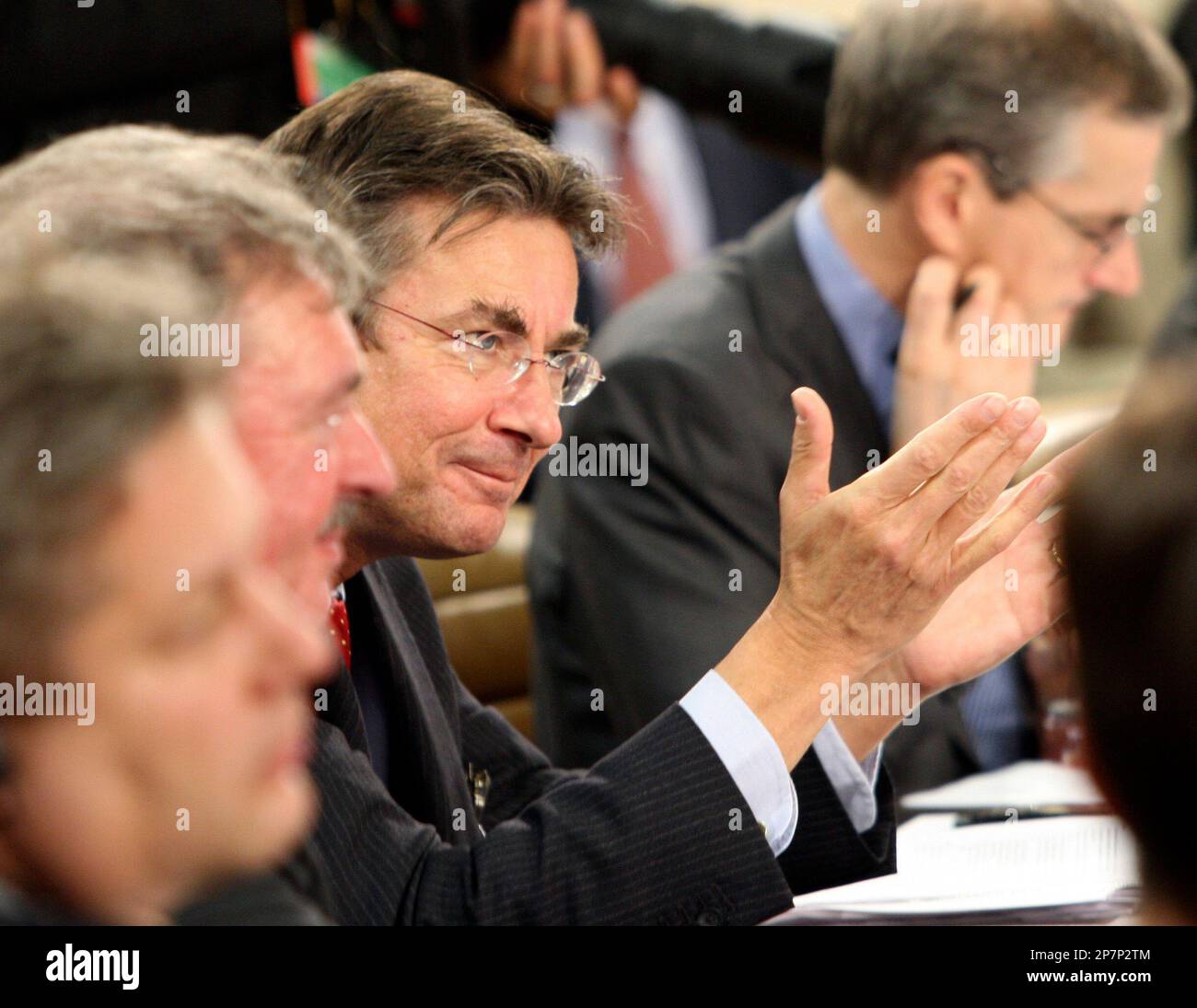 Dutch Foreign Minister Maxime Verhagen, right, gestures, as he attends ...