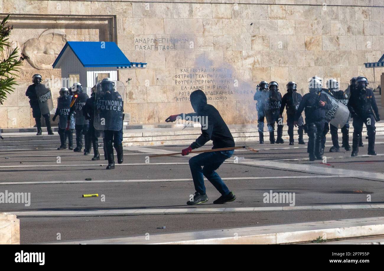 Athens, Greece. 8th Mar, 2023. A protester clashes with riot police ...