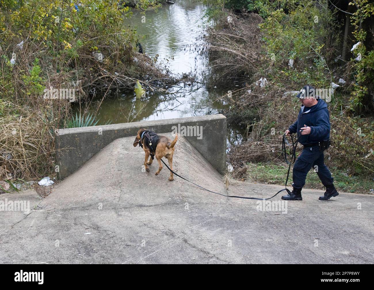 Texas Department of Criminal Justice K-9 officer David Welch, and Dixie ...