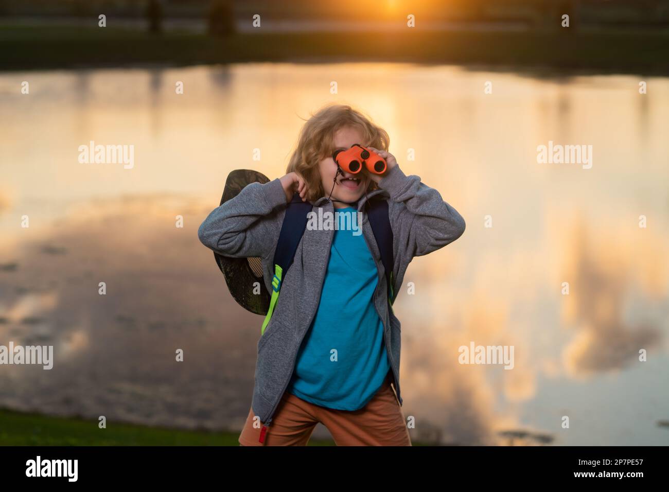 Travel and adventure concept. Little child boy tourist explorer with ...