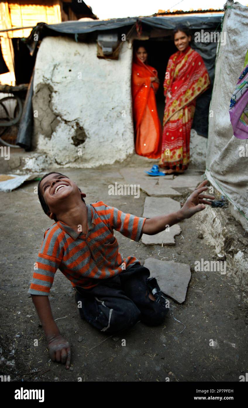 In this Sunday, Nov. 22, 2009 photograph, Suraj Rai laughs as his ...