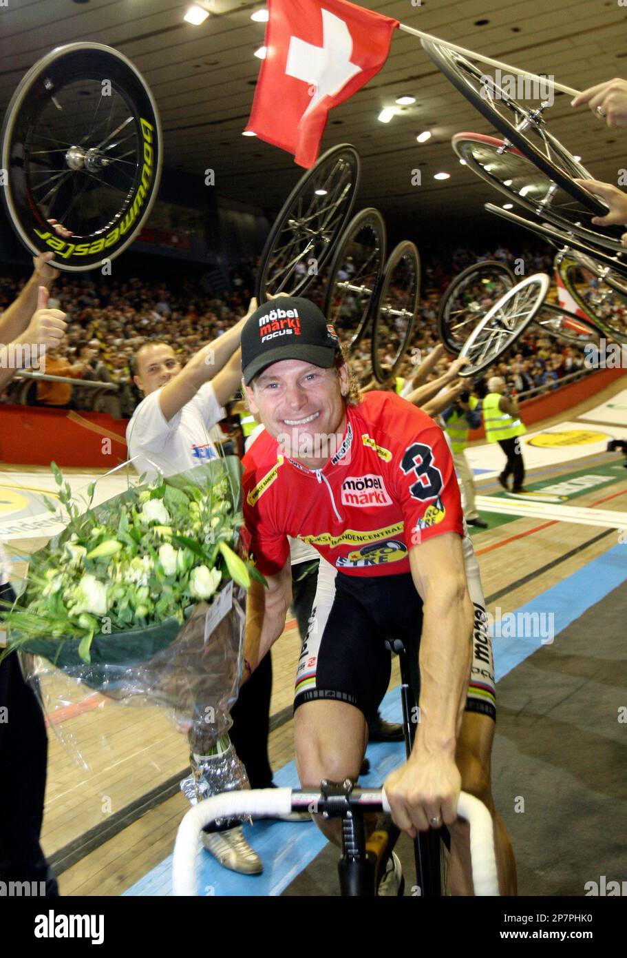 Switzerland's Bruno Risi reacts, as he celebrates the end of his career ...