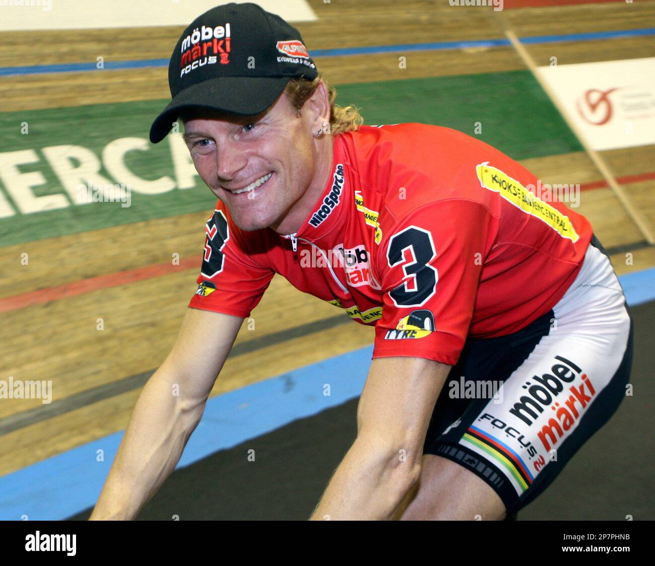 Switzerland's Bruno Risi reacts, as he celebrates the end of his career ...