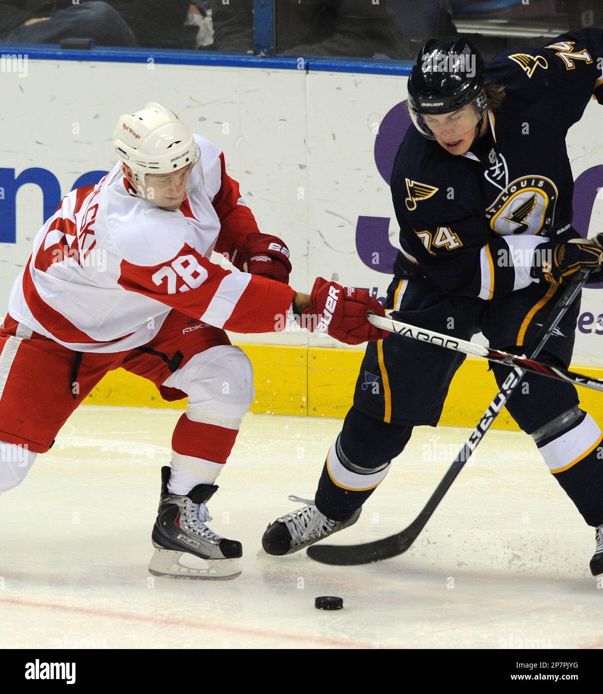 St. Louis Blues' TJ Oshie (74) and Detroit Red Wings' Brian Rafalski ...