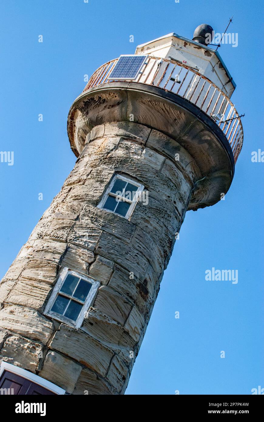 Images of an old, stone,weathered Lighthouse at Whitby Harbour marking ...